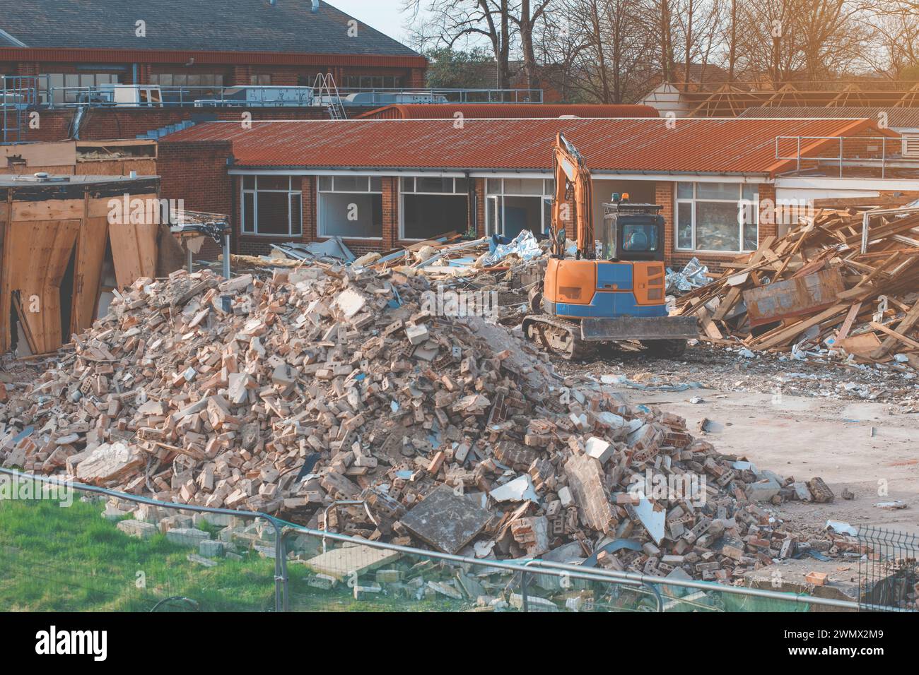 Ruins of a demolished building. Dismantling an old building. Pile of ...