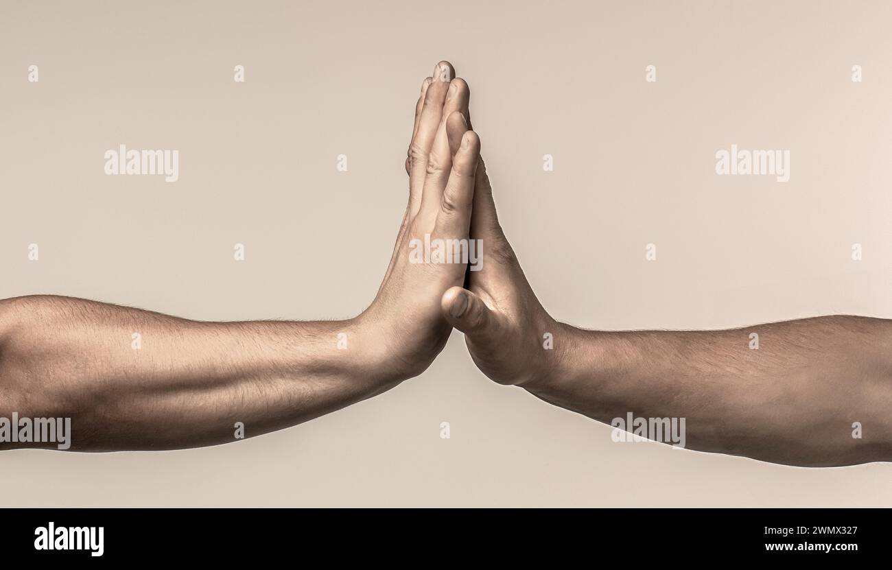 High five gesture of man and girl, successful cooperation. Two hands ...