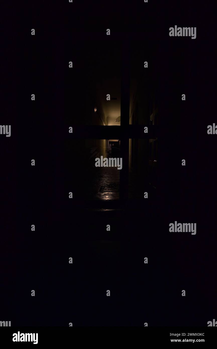 Entrance and glass door of a building at night seen from outside Stock ...