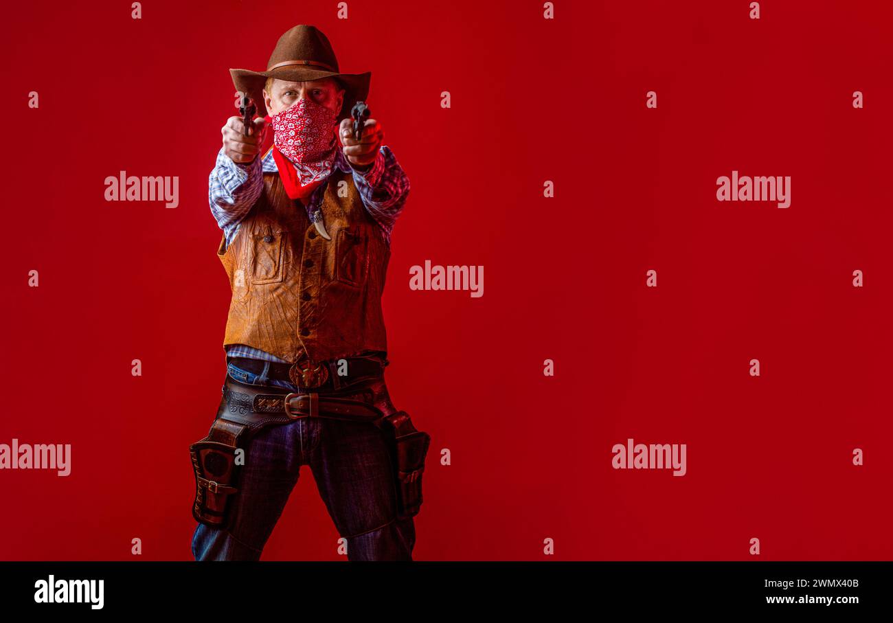 Cowboy with a pistol, guy in a cowboy hat with a gun. Western man with ...