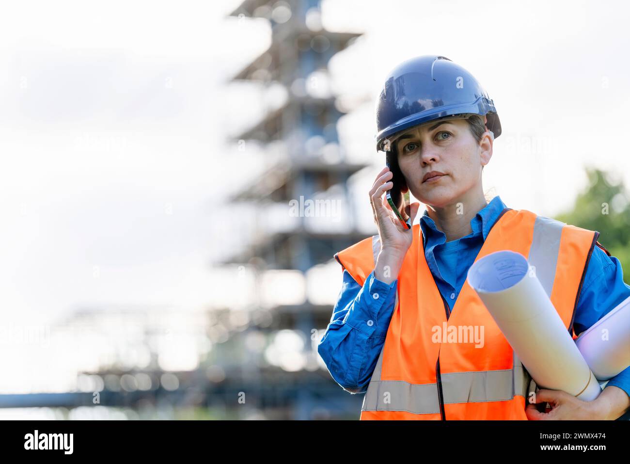 Female site engineer surveyor working with theodolite total station EDM ...