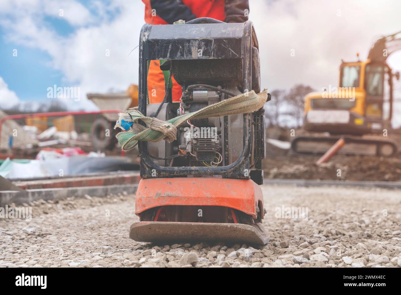 Vibrating plate compactor osed to compact ground and stone on building ...