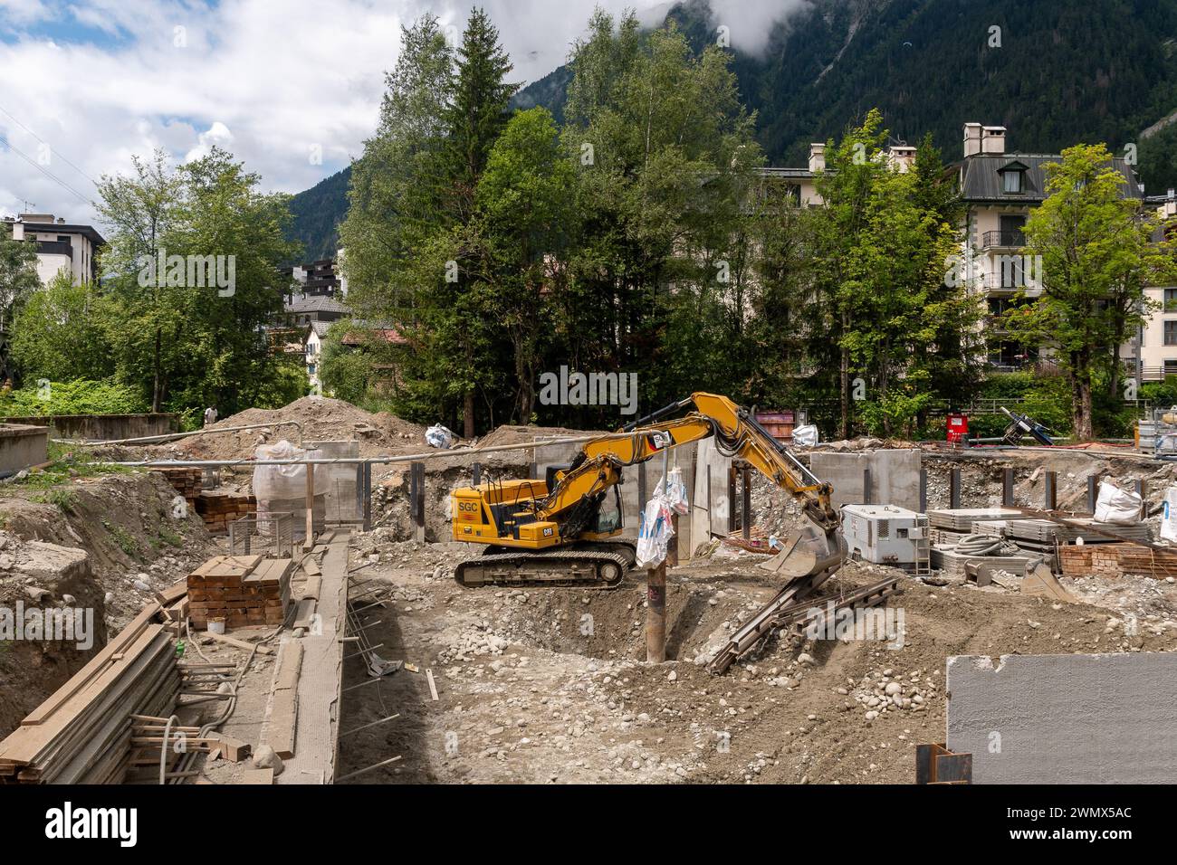 Excavation of the foundation in a construction site of luxury holiday ...