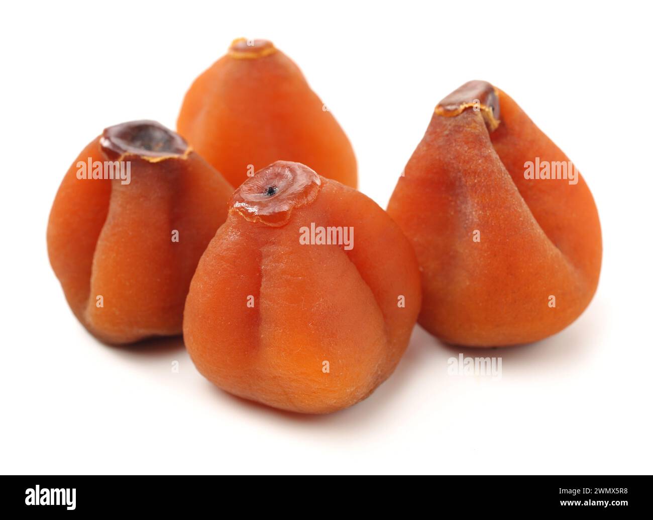 Persimmon group on red Cut Out Stock Images & Pictures - Alamy