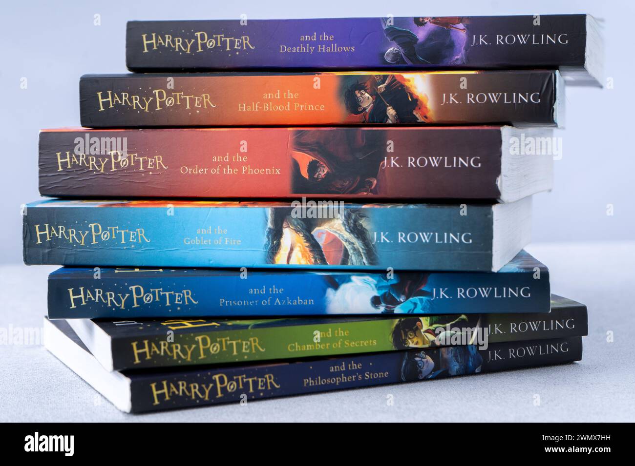 A stack of books about Harry Potter by writer JK Rowling. Collection ...