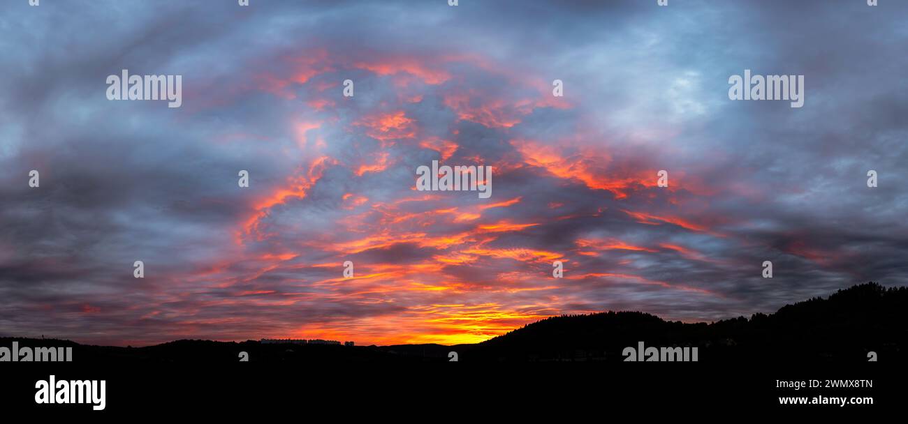 Silhouette of landscape on dramatic dusk sky with clouds. Mysterious ...