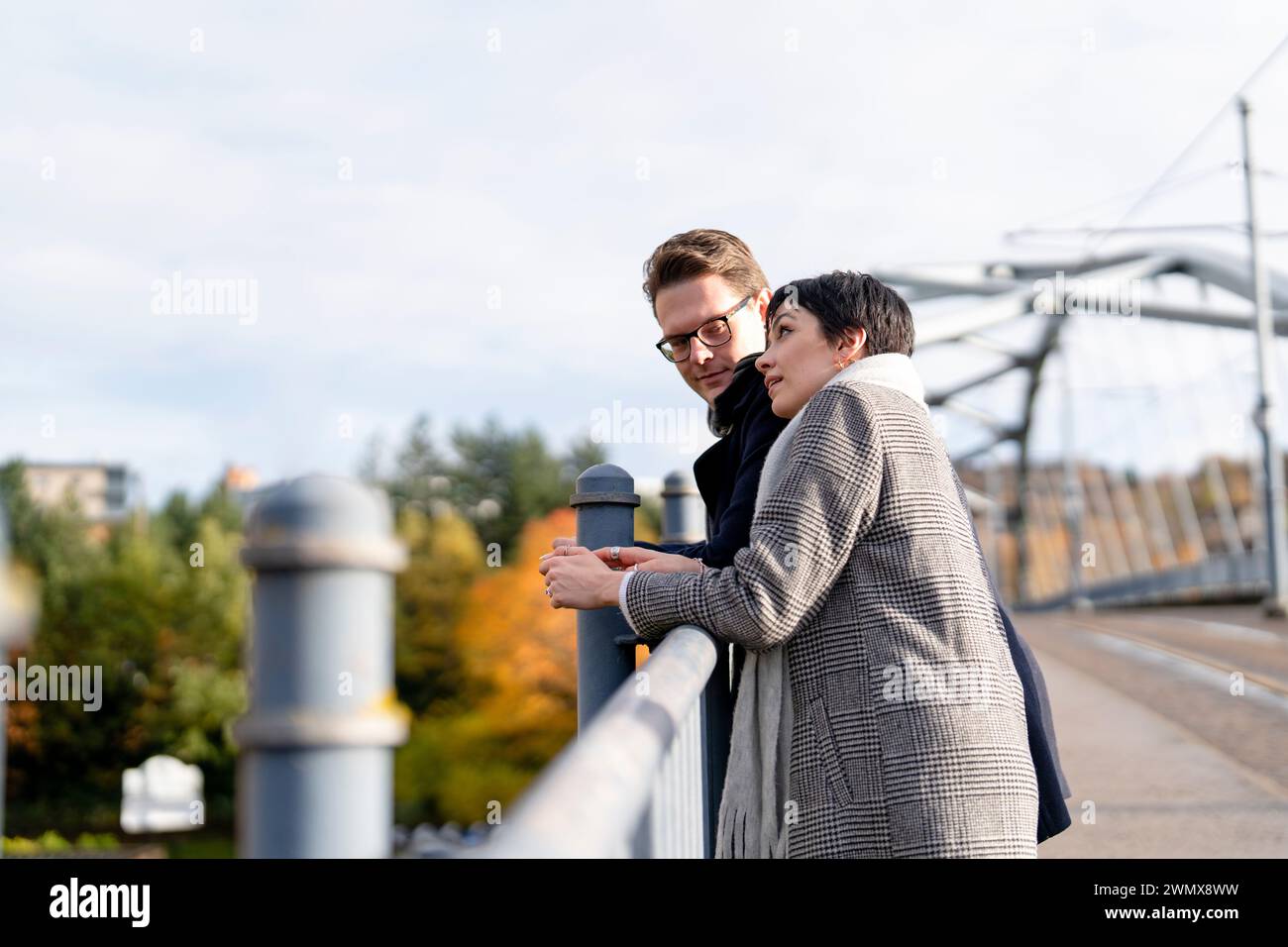 Handsome man and beautiful woman falling in love, hugging each other ...
