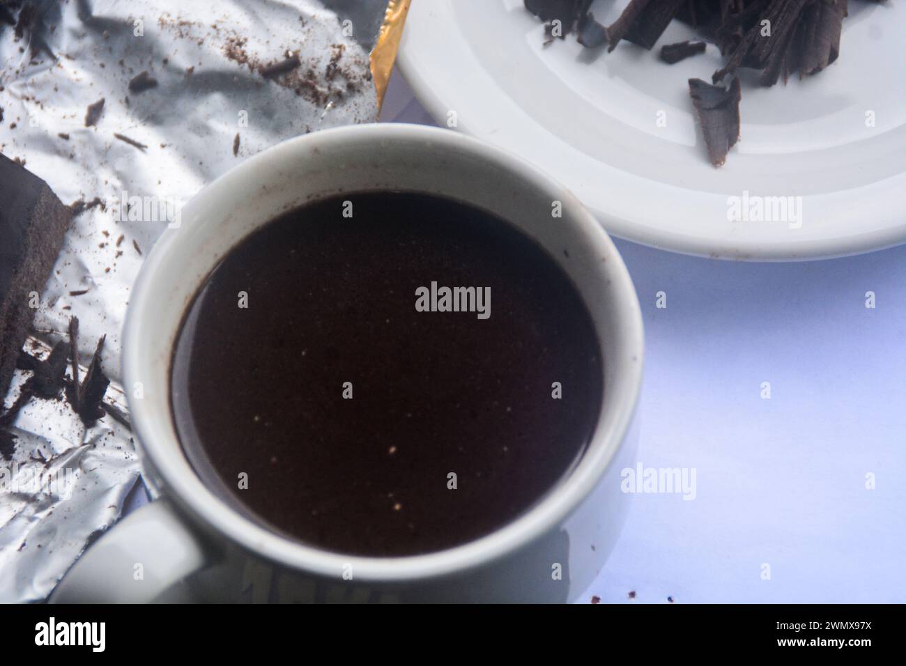 hot chocolate drink in a white cup. Its thick texture is drunk when it ...
