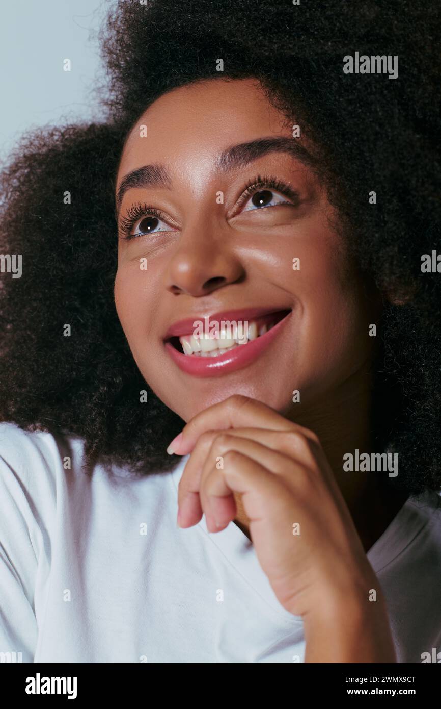 portrait of joyous appealing african american woman posing and looking ...