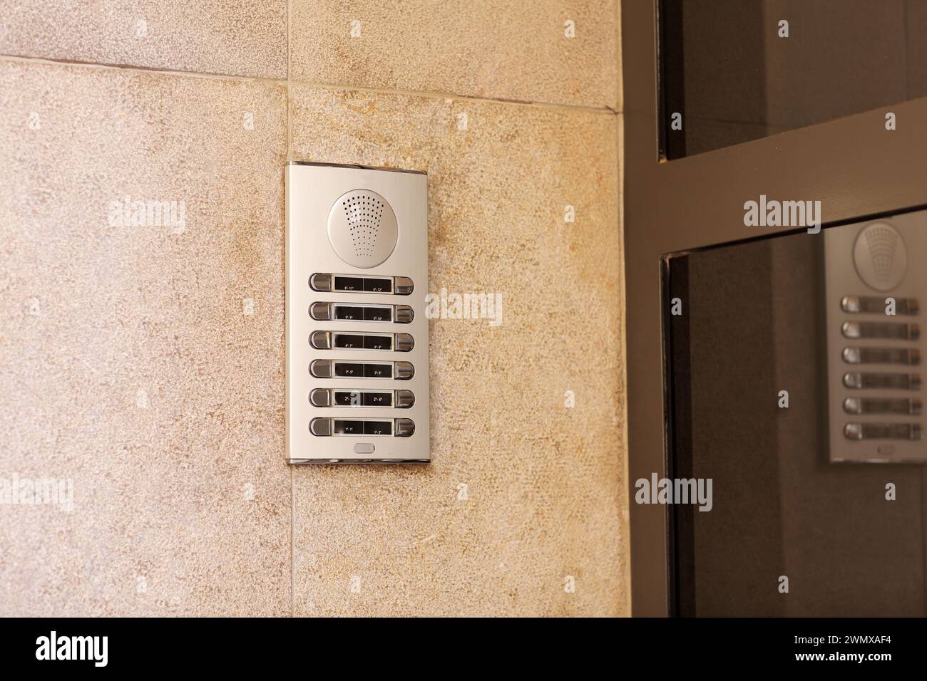 Outdoor intercom outside a residential building with empty name tag ...
