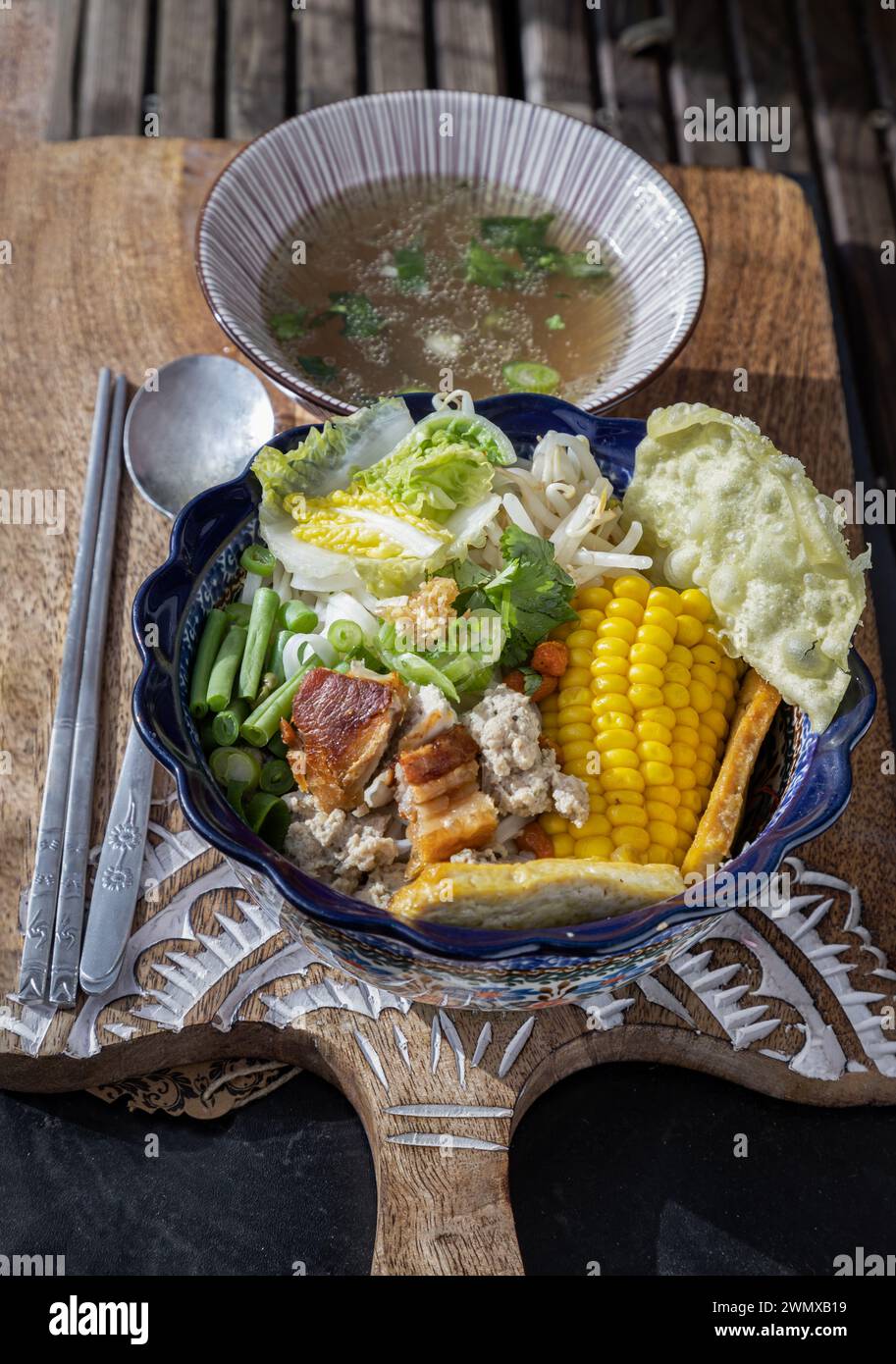 Rice stick noodles topped with Minced pork, Crispy pork, Fried wontons ...