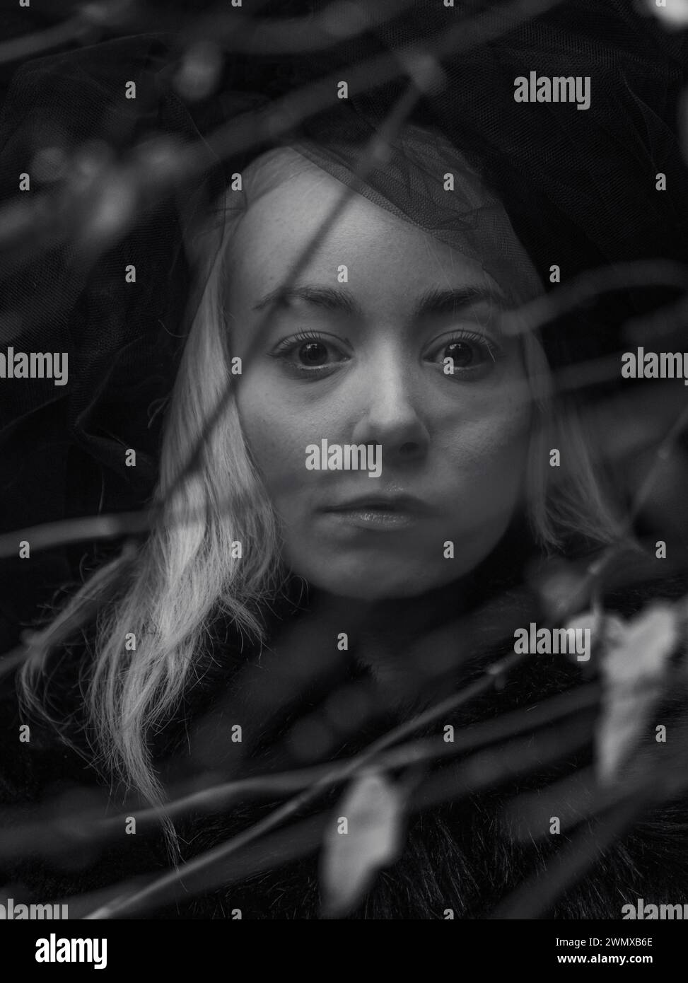 An intense black and white close-up of a white caucasian young ...