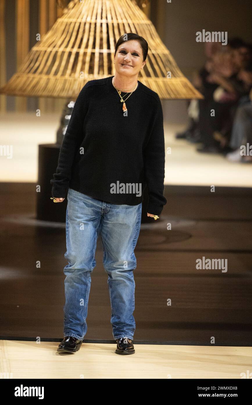 Designer Maria Grazia Chiuri accepts applause following the Christian ...