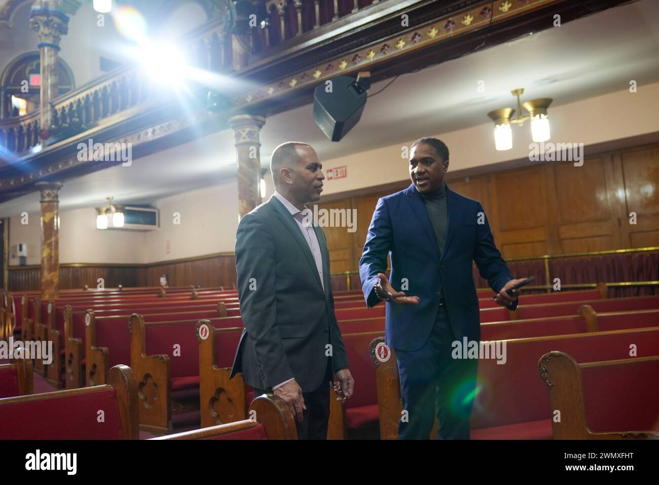 House Minority Leader Hakeem Jeffries, D-N.Y., left, talks with Rev ...
