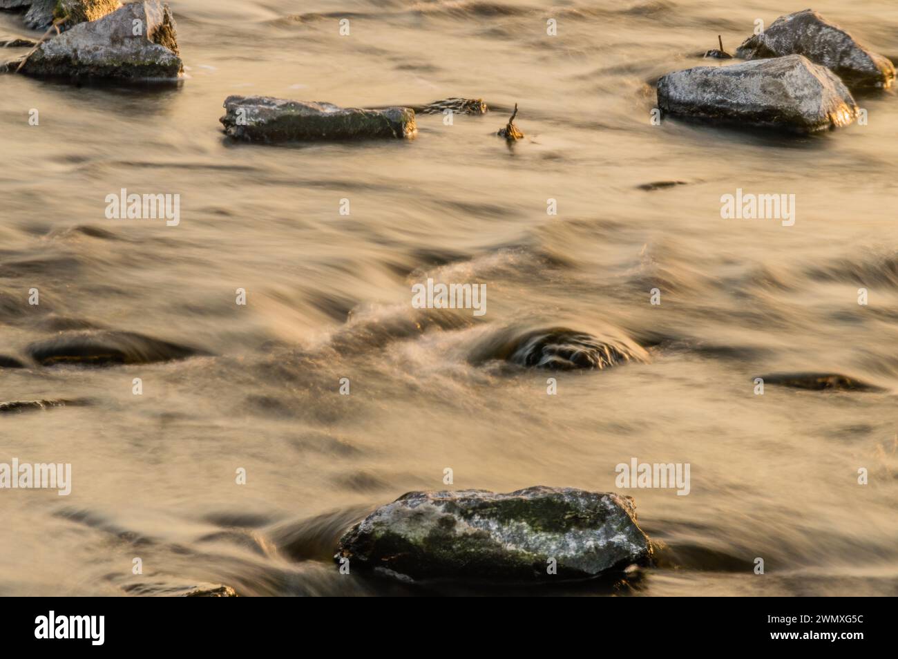 Golden flow hi-res stock photography and images - Alamy