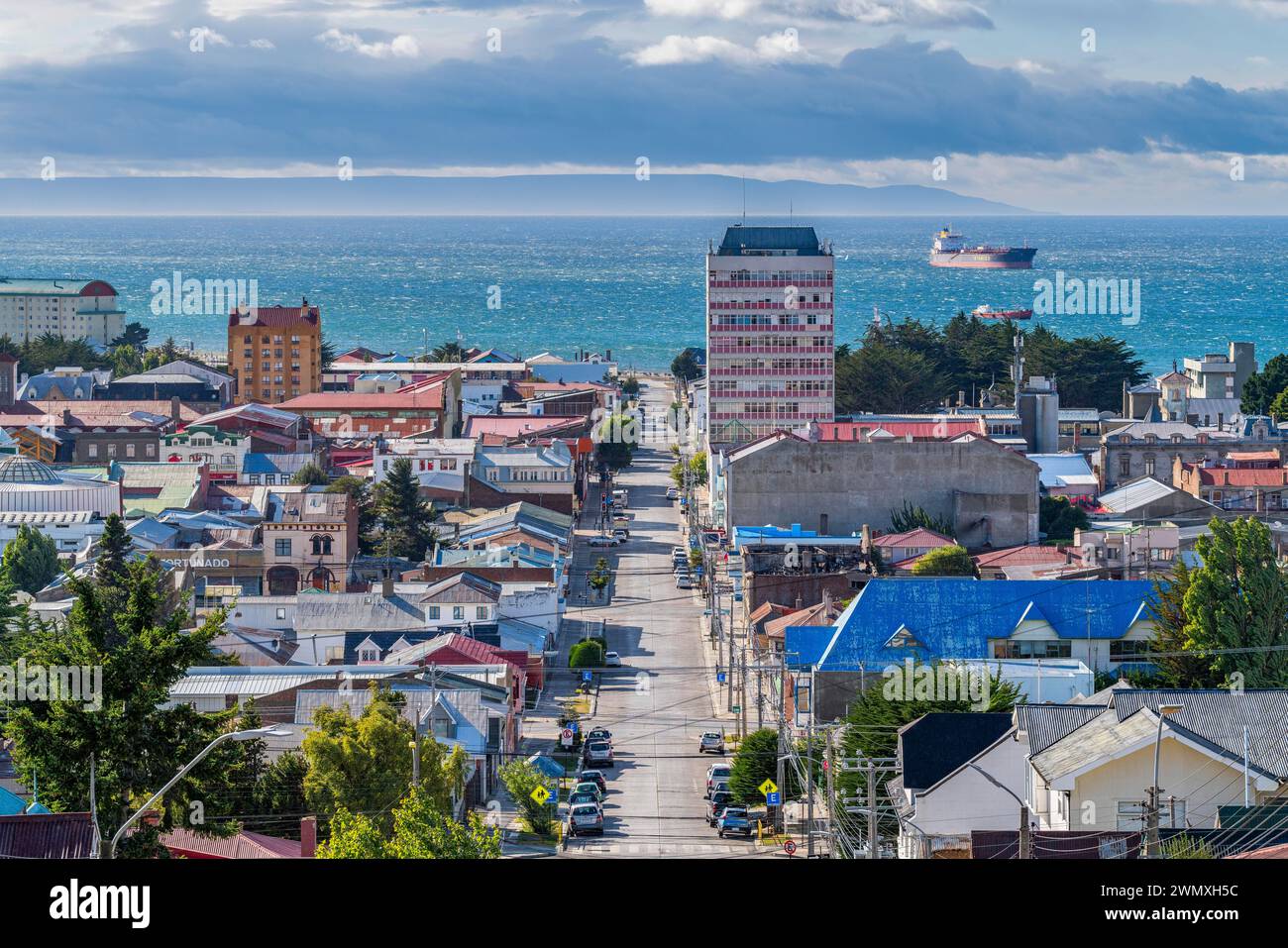 View from a hill over streets and houses to the Strait of Magellan ...