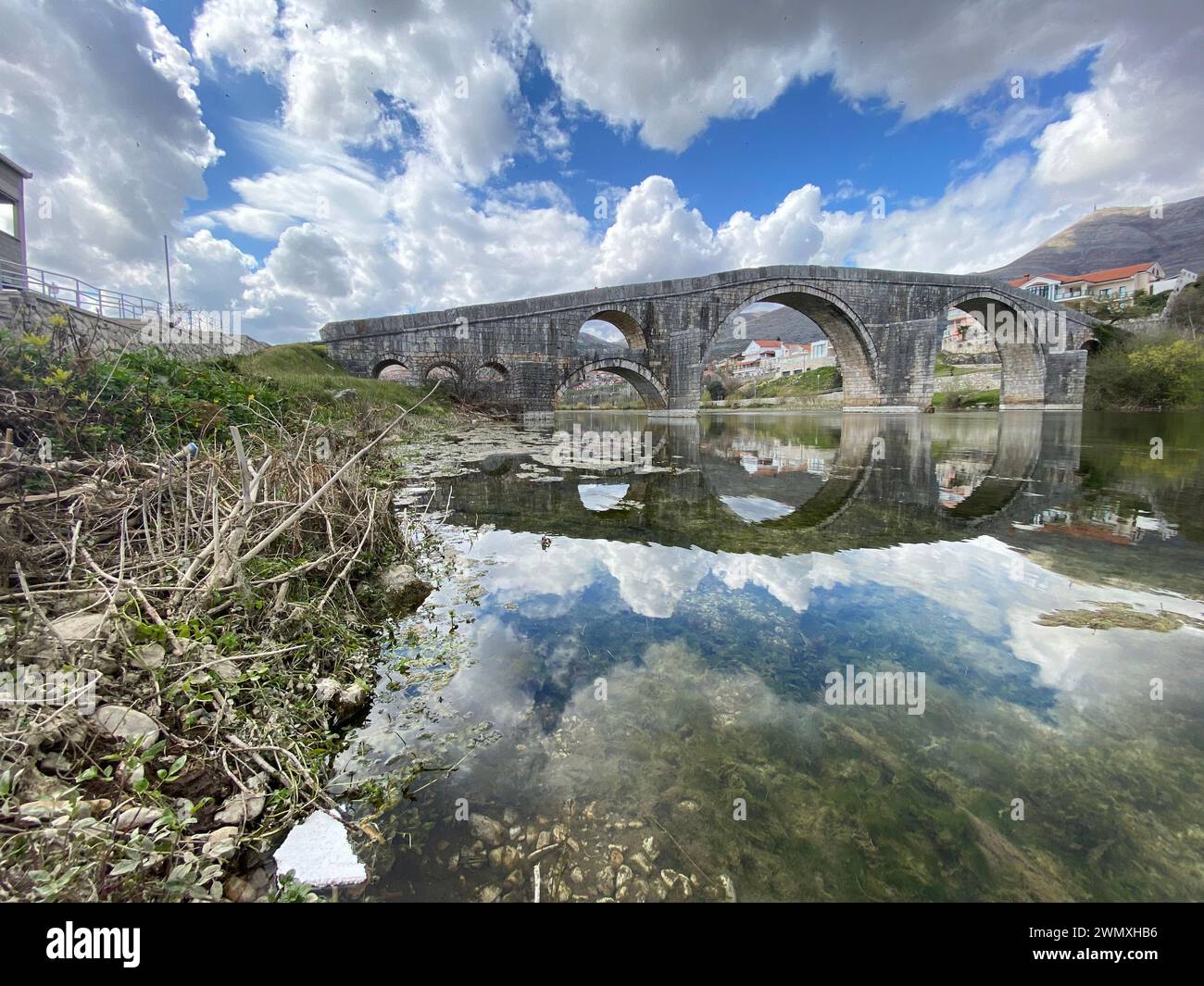 Historic Crossing: Captivating River Scene with Vintage Stone Bridge ...
