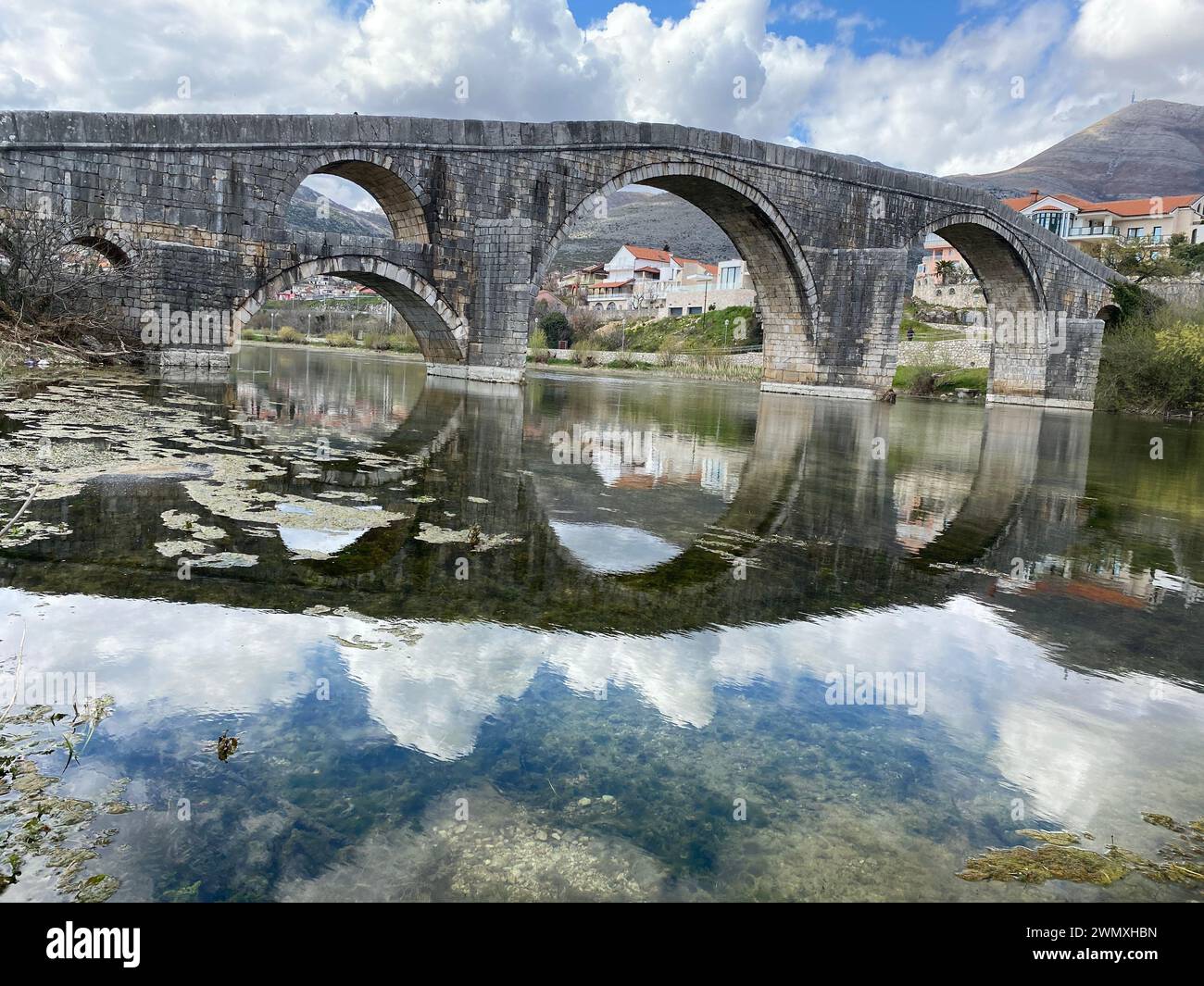 Historic Crossing: Captivating River Scene with Vintage Stone Bridge ...