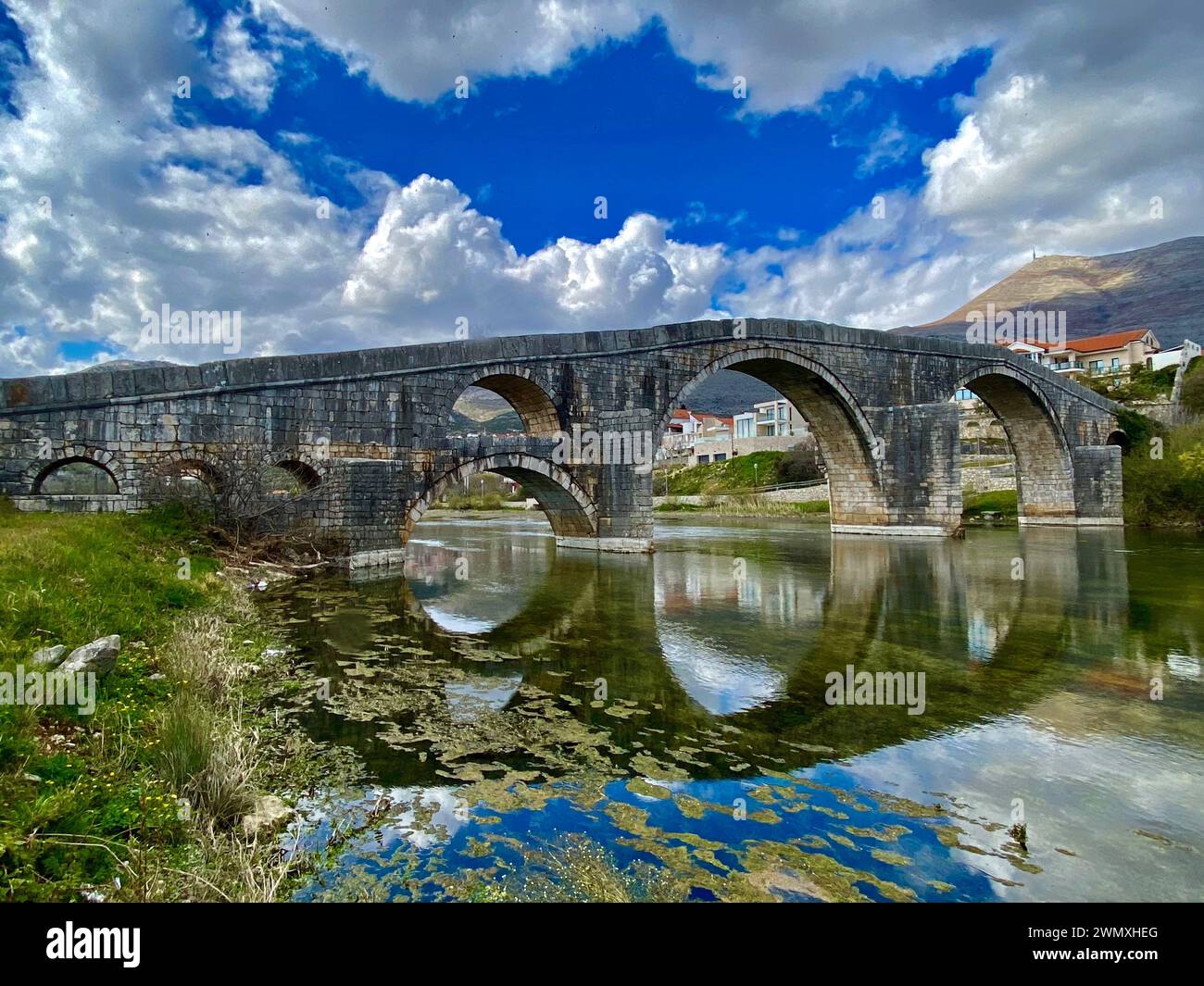 Historic Crossing: Captivating River Scene with Vintage Stone Bridge ...
