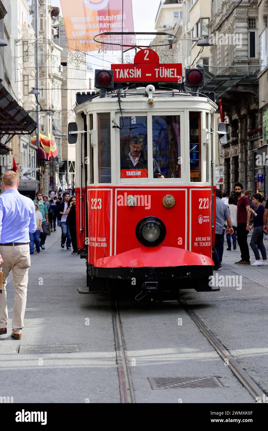 Historic tram Nostaljik Tramvay travelling through Istiklal Caddesi ...