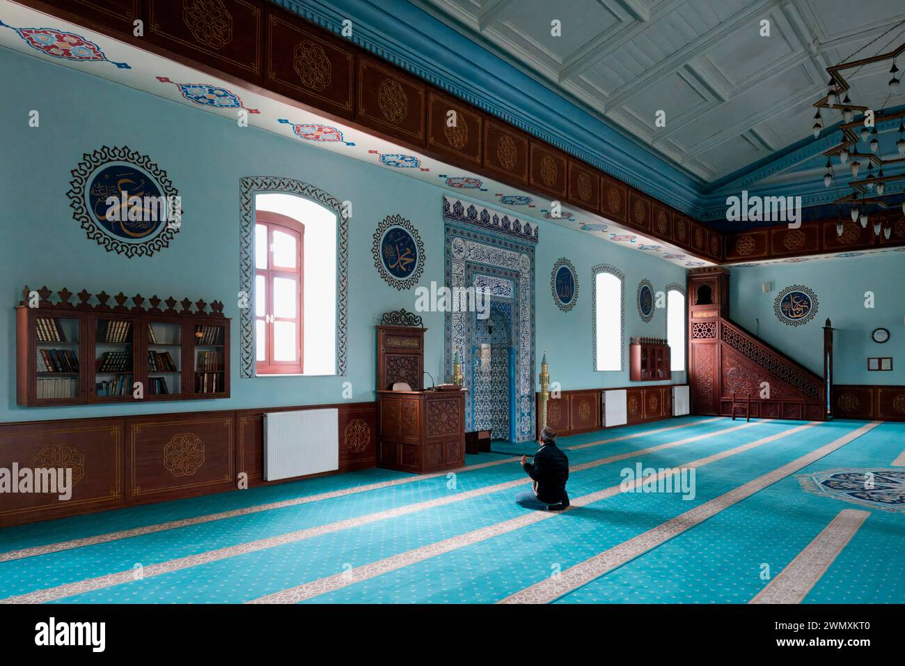 Man praying in the Fethiye Mosque, former Russian Orthodox Church ...
