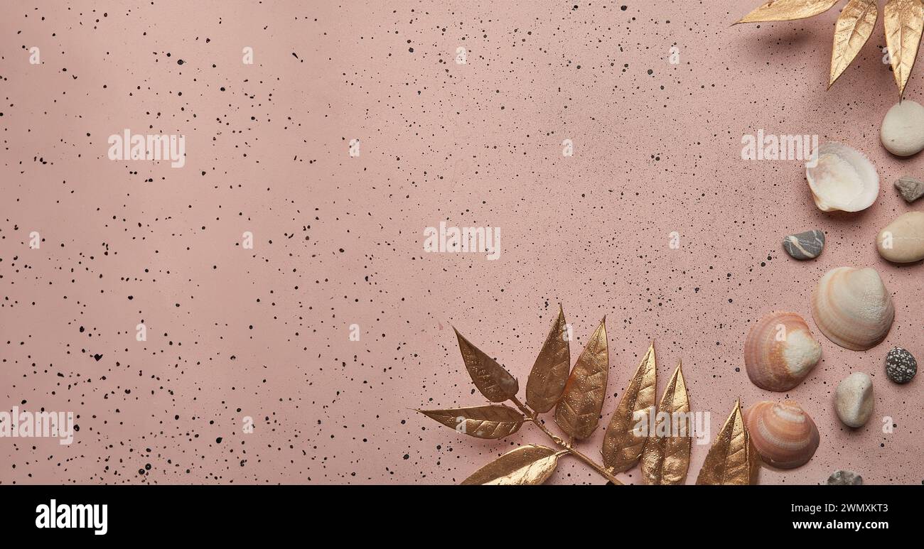 Elegant summer background with golden foliage and shells, copy space ...