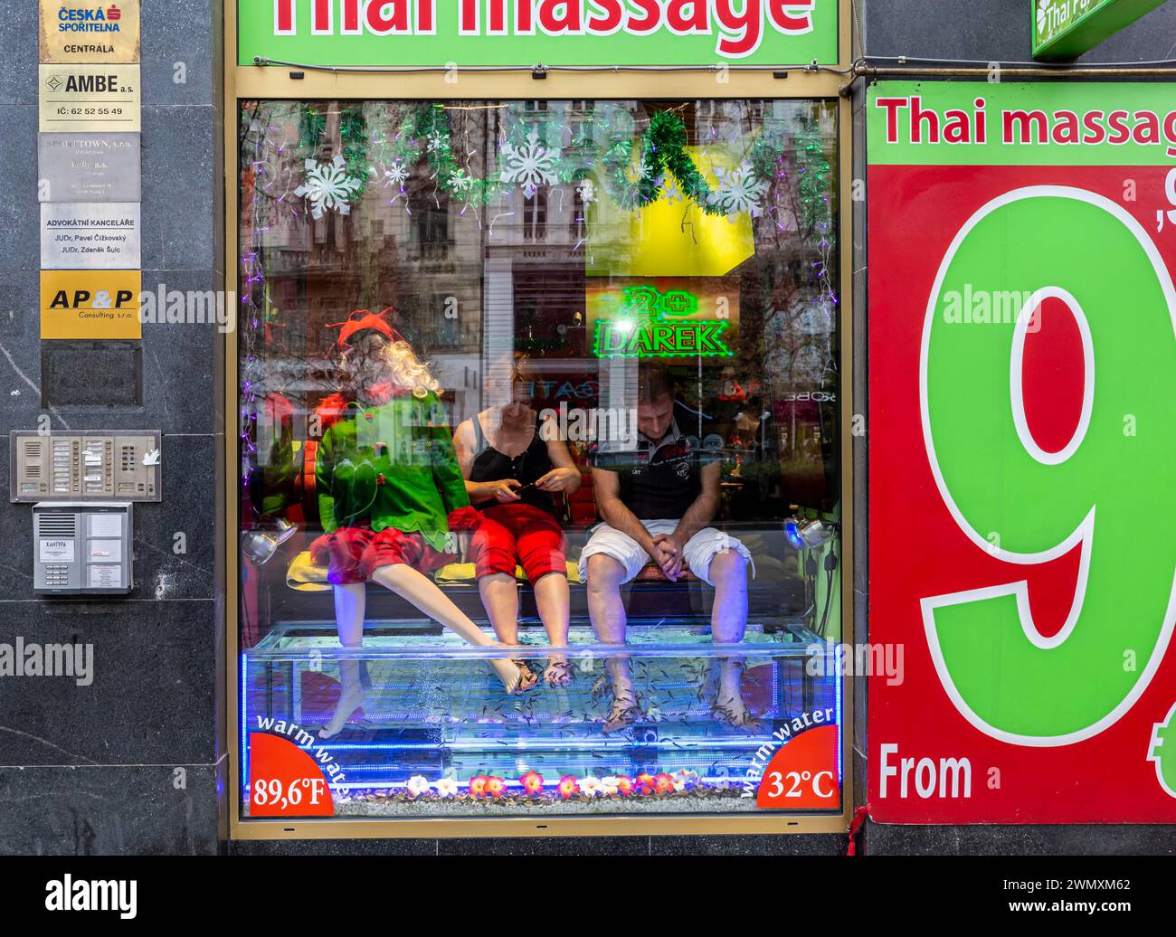 Colourful advertisement on the shop window, Thai Massage, Prague, Czech Republic Stock Photo - Alamy