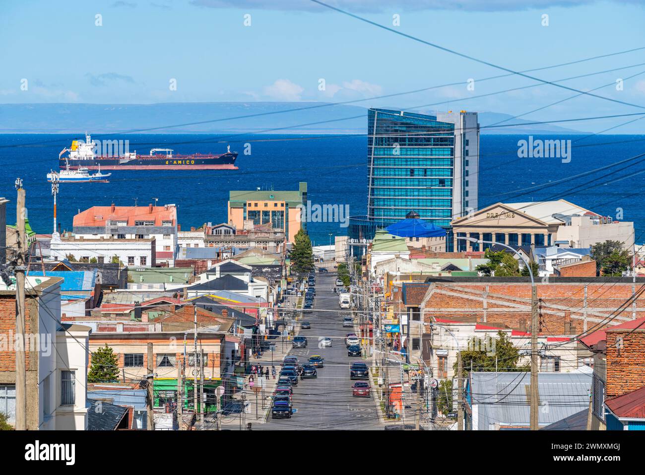 View from a hill over streets and houses to the Strait of Magellan ...