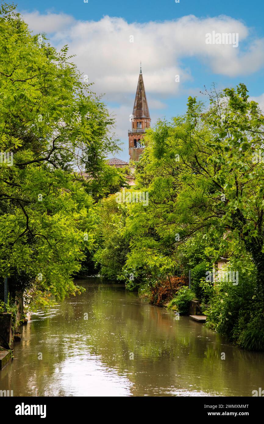 River Lemene with view of the cathedral of S. Andrea APostolo, medieval ...