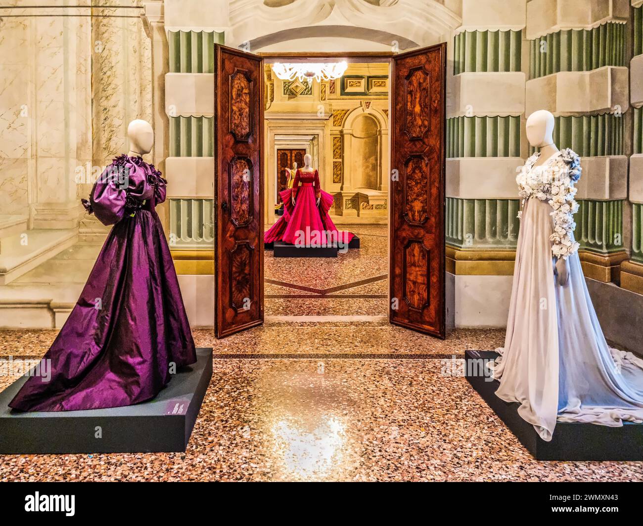 Exhibition of magnificent evening dress creations by fashion designer ...