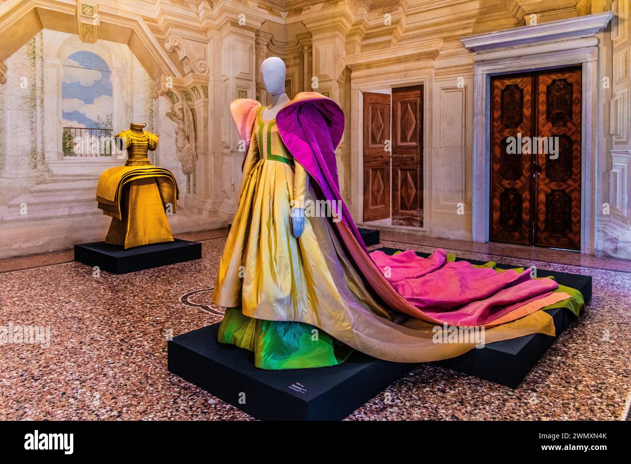 Exhibition of magnificent evening dress creations by fashion designer ...