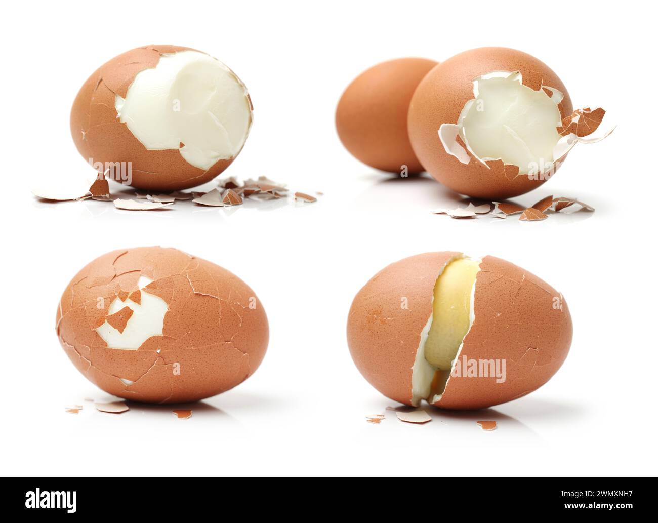 Break eggs on a white background Stock Photo - Alamy
