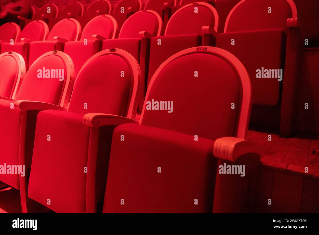 rows of empty spectator seats in a circus or theater. red upholstered ... rows of empty spectator seats in a circus or theater. red upholstered ...