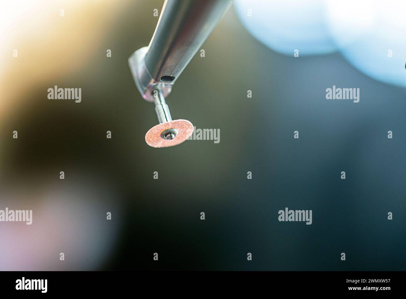 close-up of a dental bur machine attachment. Treatment and restoration ...