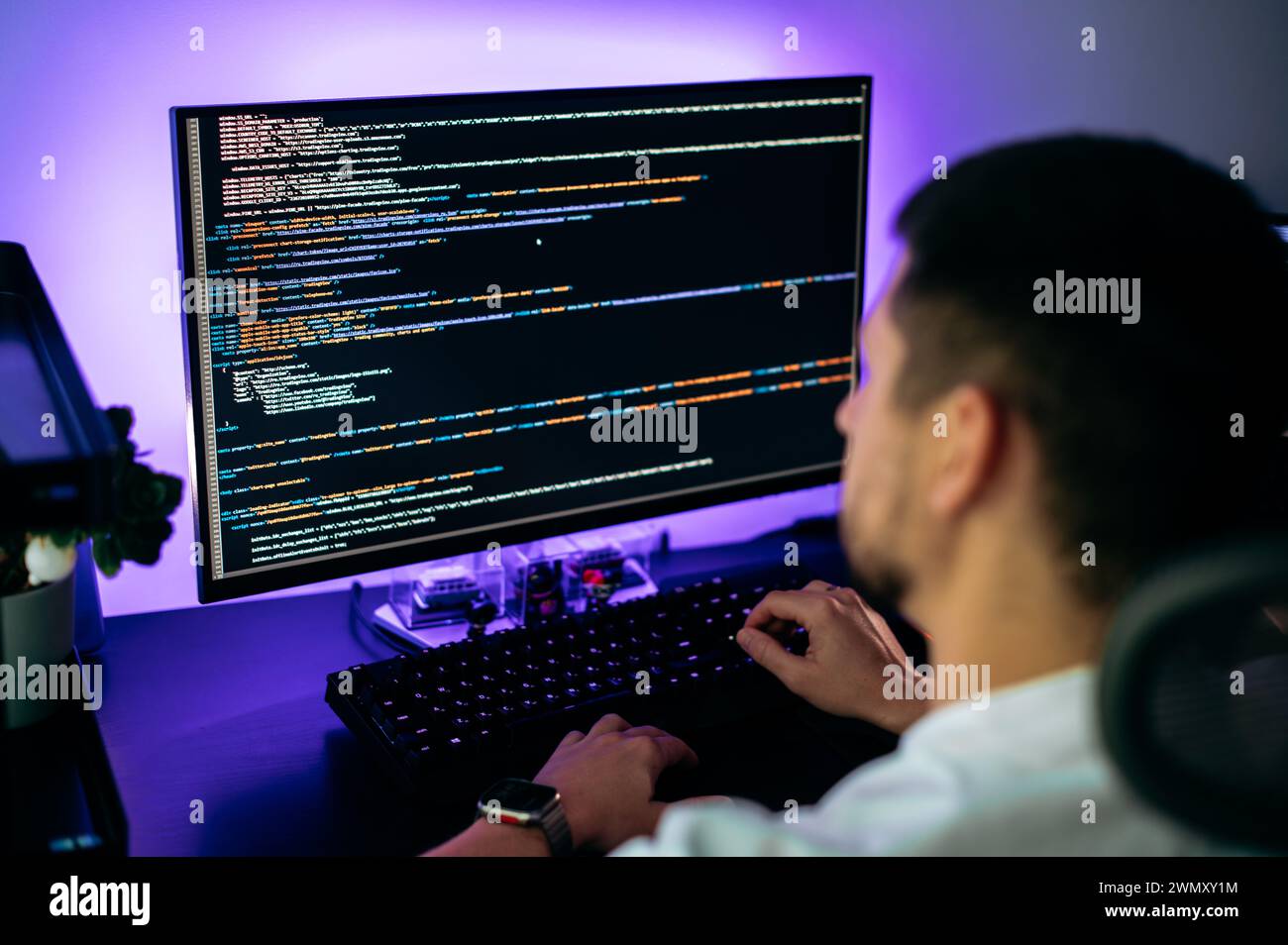 Database programmer typing server code hi-res stock photography and ...