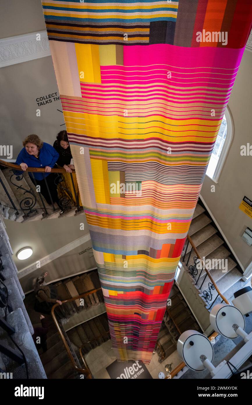 London, UK. 28 February 2024. Textile artist Margo Selby's 16m tall ...