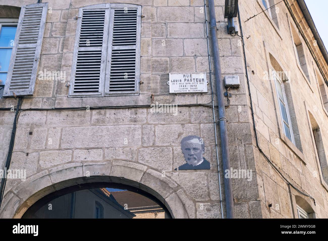 France, Jura, Dole, Louis Pasteur street sign and mosaic Invader Stock ...