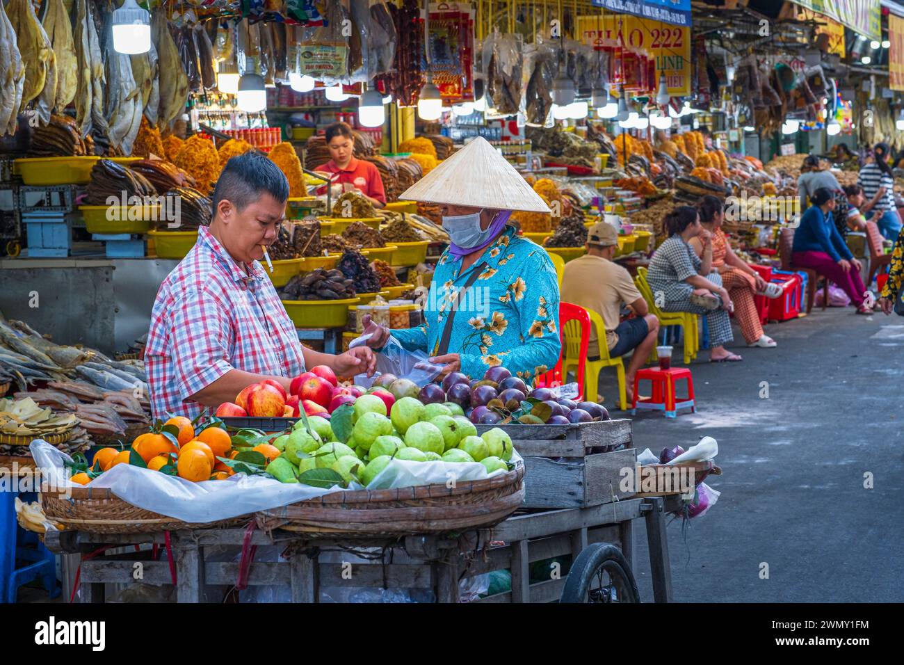 Vietnam, Mekong Delta, An Giang province, Chau Doc, street fruit seller ...
