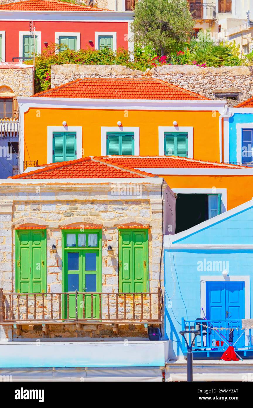 Greece, Dodecanese islands, Halki island, Traditional houses by the sea ...