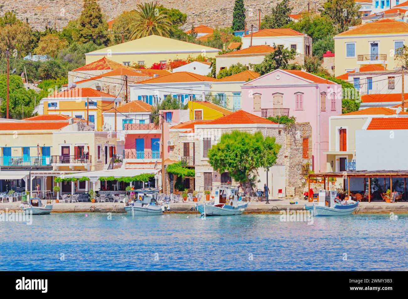 Greece, Dodecanese islands, Halki island, View of the port of Emporio ...