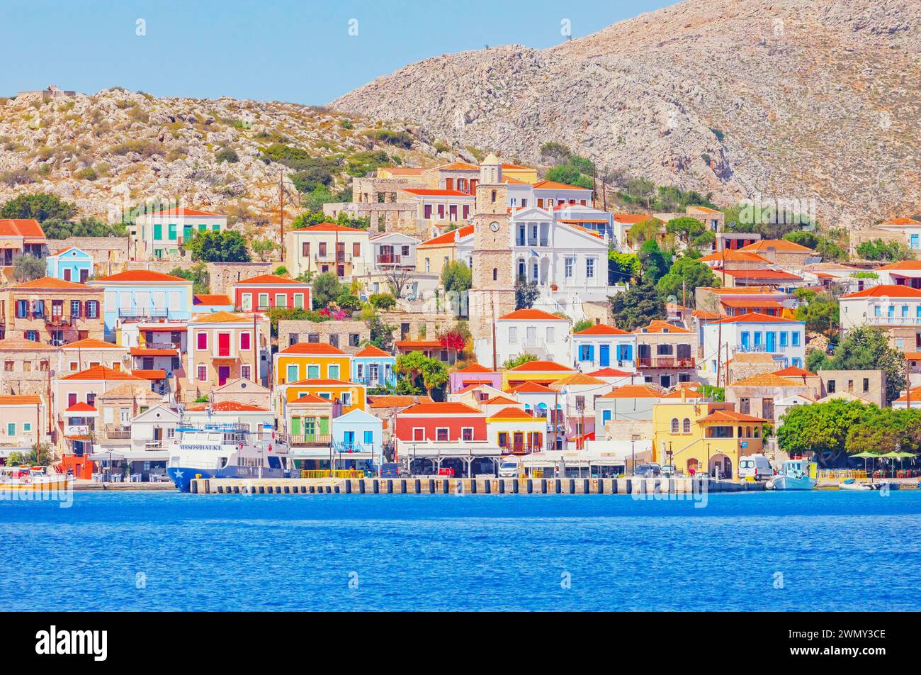 Greece, Dodecanese islands, Halki island, Traditional houses by the sea ...
