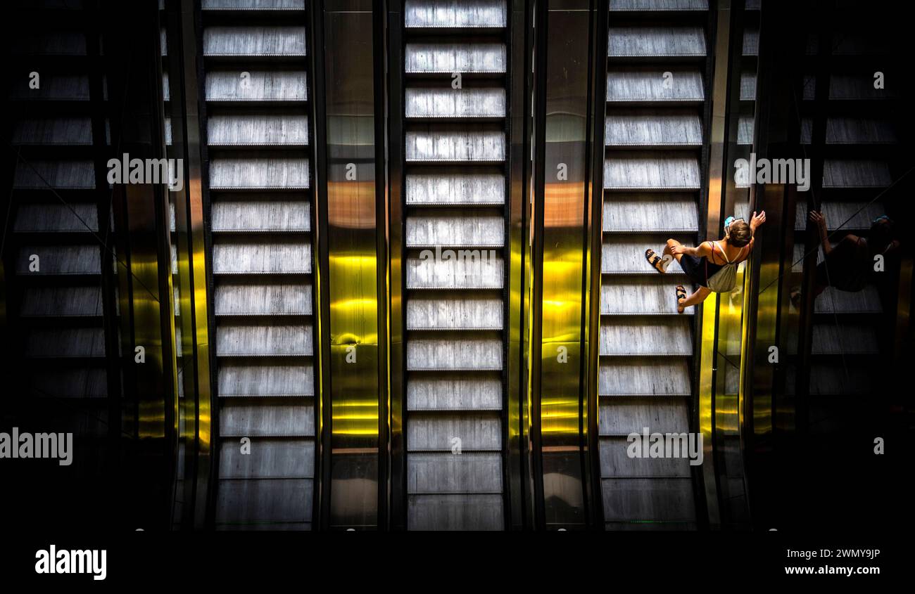 The escalator in Vienna Central Station seen from above with one person ...
