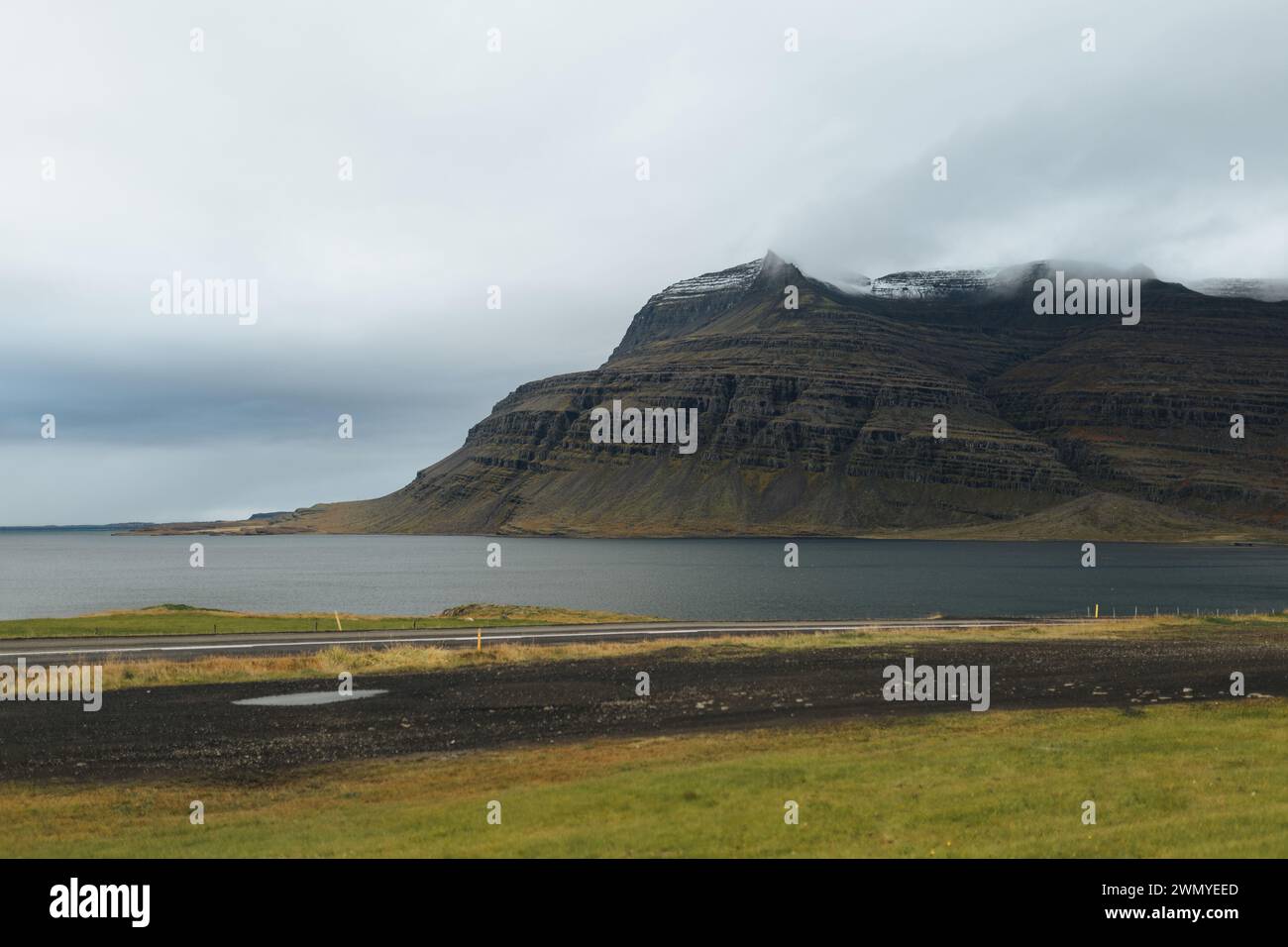 An overcast day showcases the grandeur of an Icelandic mountain ...