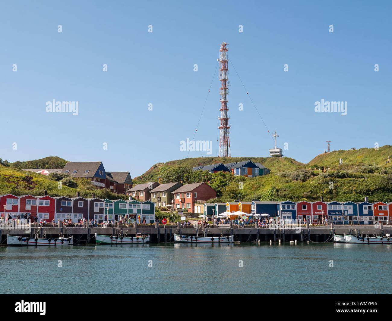 Promenade with wooden lobster shacks at harbour of Helgoland, island in ...