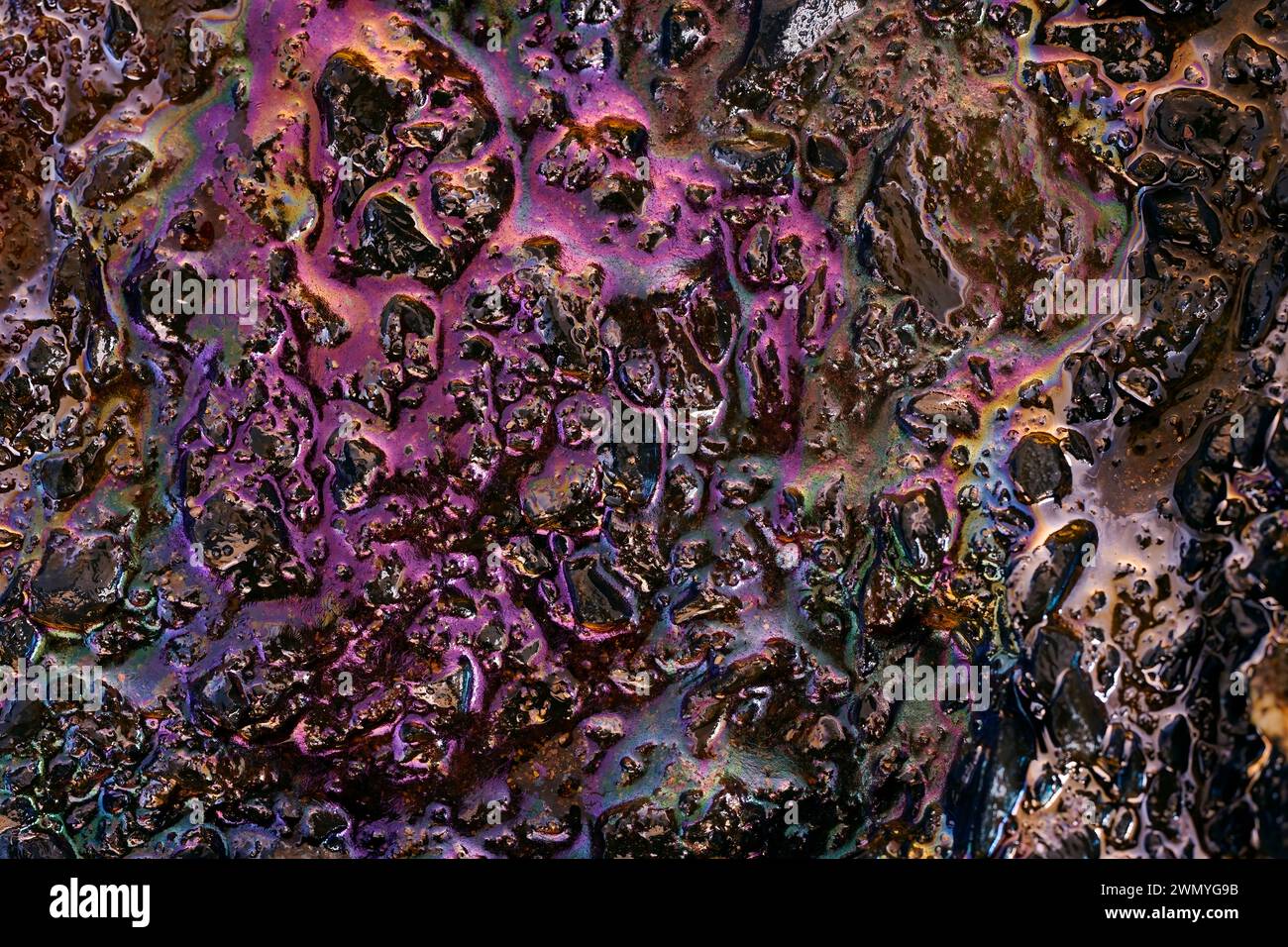 Close-up of colorful biofilm bacteria thriving on iron-rich rocks at ...