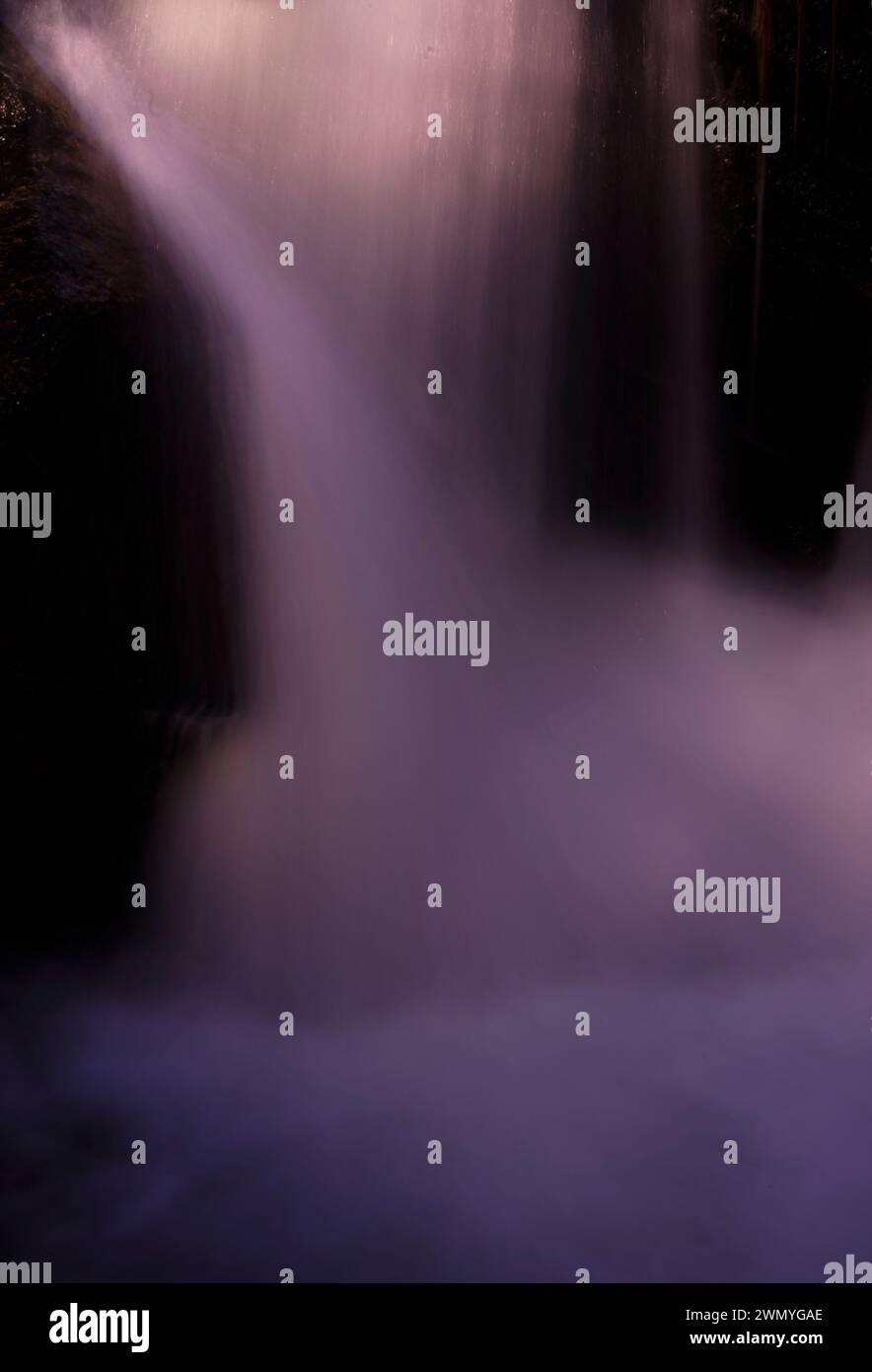 Ethereal capture of water in motion, creating a smooth, silky texture ...