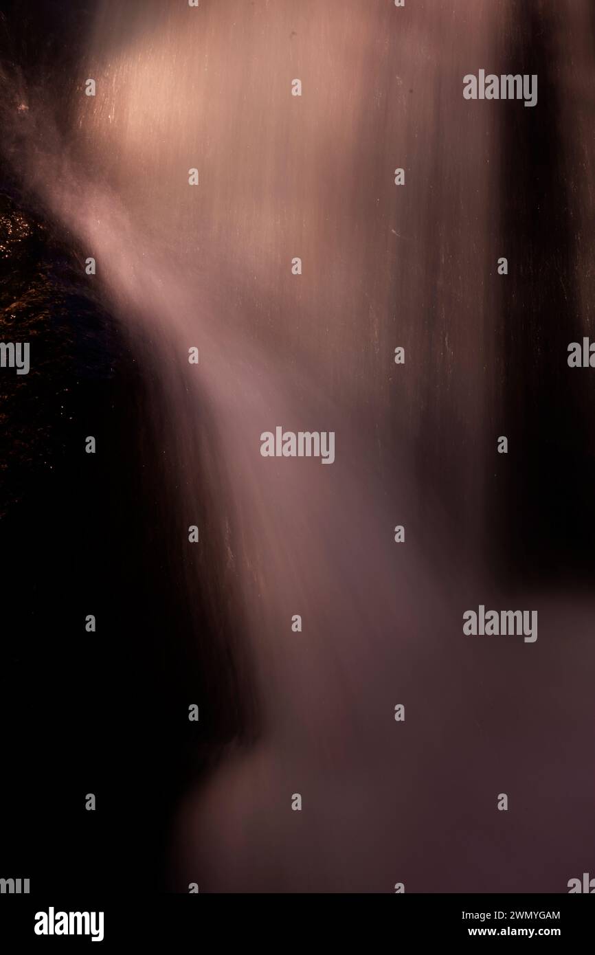 Ethereal capture of water in motion, creating a smooth, silky texture ...