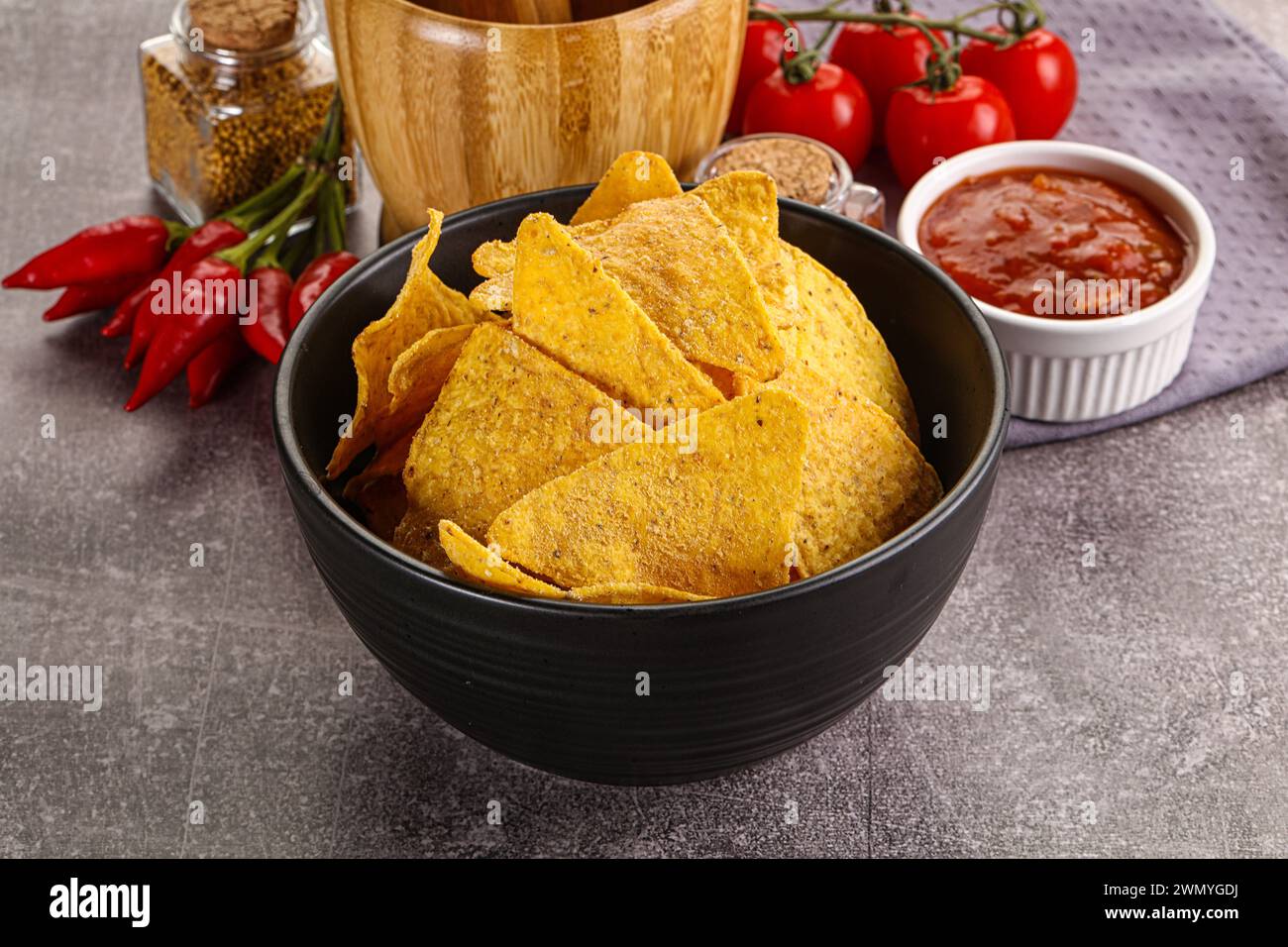 Mexican corn nachos chips with salsa dip Stock Photo - Alamy