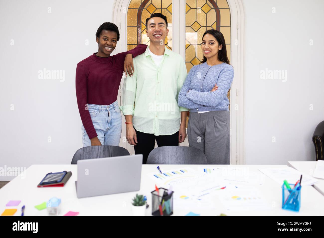 Three professionals stands hi-res stock photography and images - Alamy