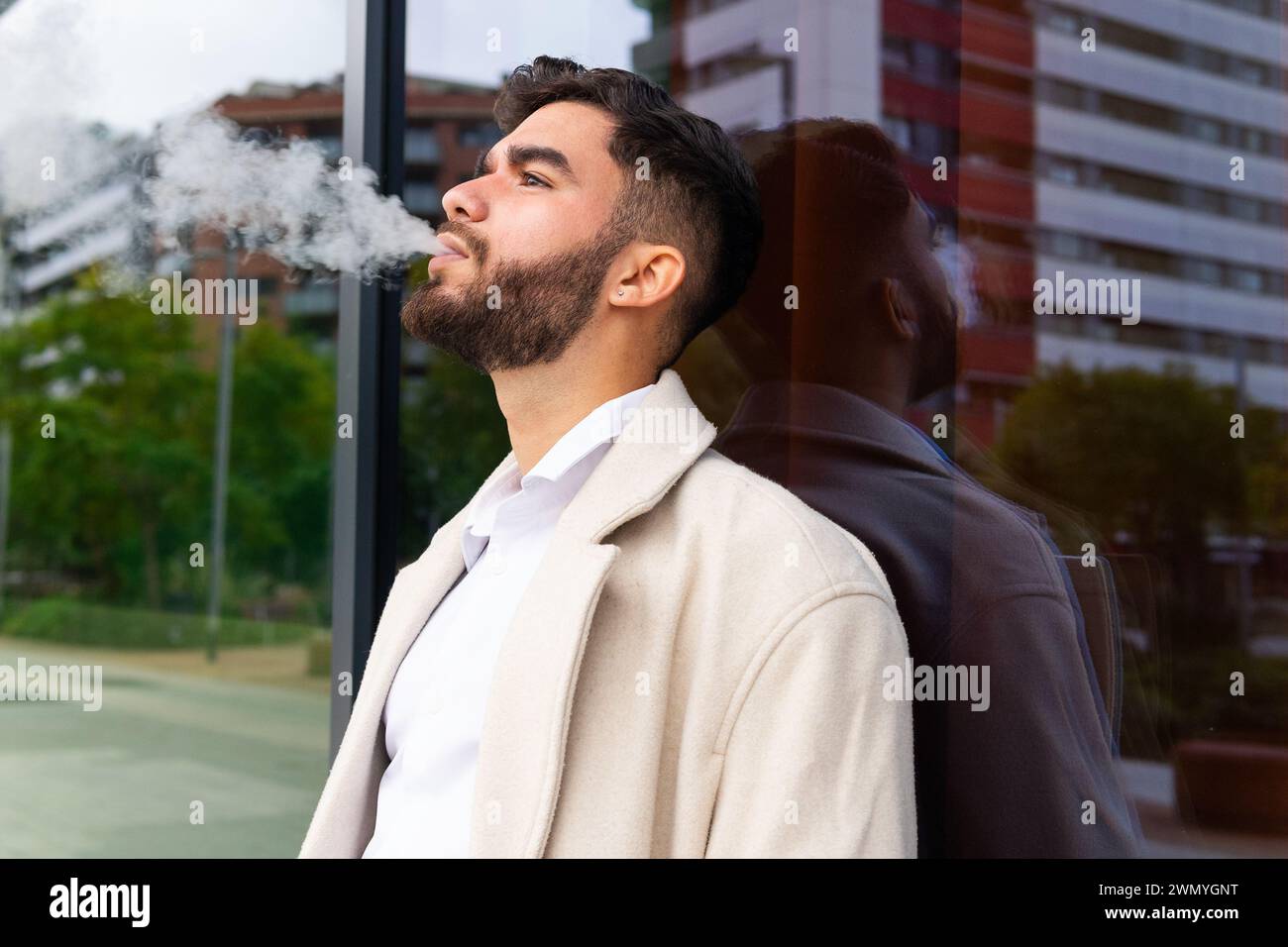 Stylish beige coat hi-res stock photography and images - Alamy